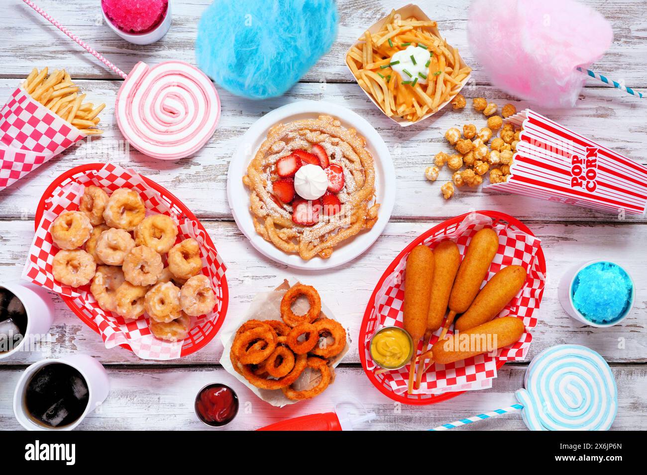 Carnival theme food double border over a white wood banner background ...