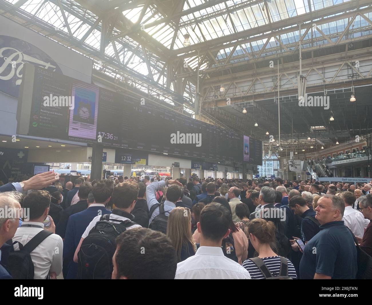 People waiting to board trains at London's Waterloo station after a ...