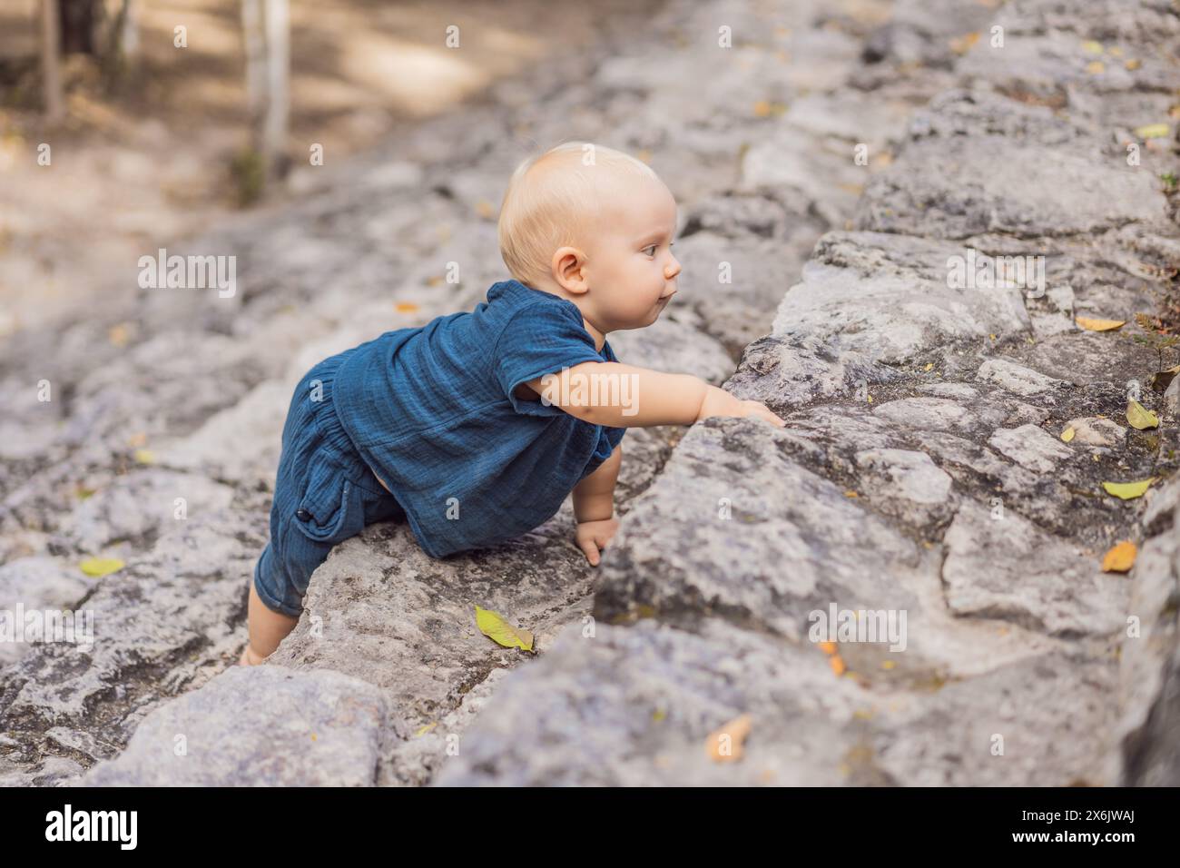 Baby tourist at Coba, Mexico. Ancient mayan city in Mexico. Coba is an ...