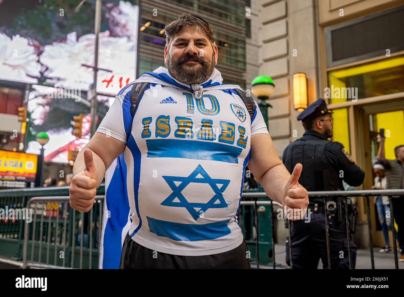NEW YORK, NEW YORK - MAY 13: A pro-Israel supporter weas an Israeli ...