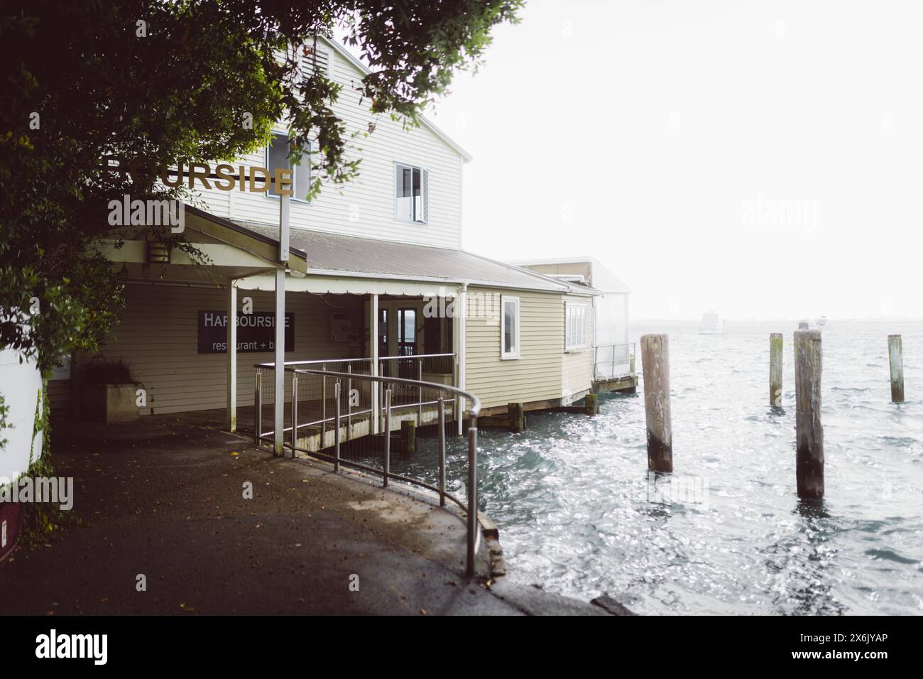 Fog over the water by the lake, Old Harbourside Restaurant in Tauranga ...