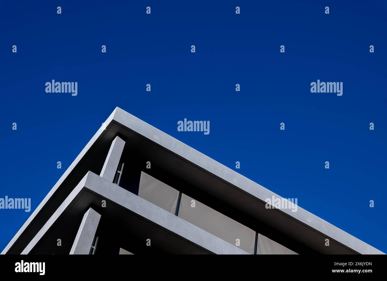 Corner Shape of a Modern Design Building Against Clear Blue Sky in a ...