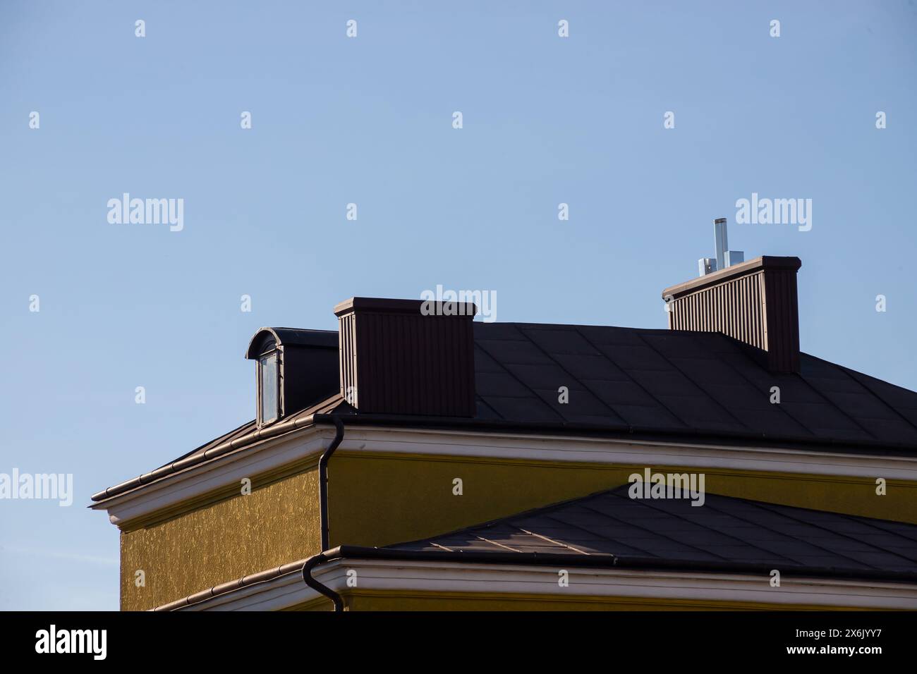 New roofing construction with attic skylights, rain gutter system, roof ...