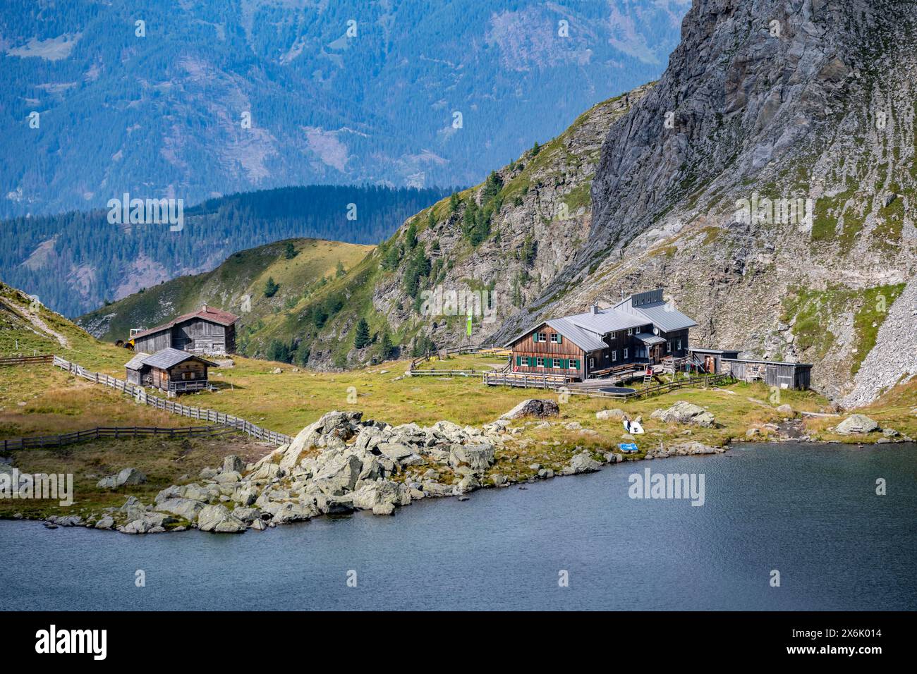 Obstanserseehuette, Obstansersee mountain lake between green mountain ...