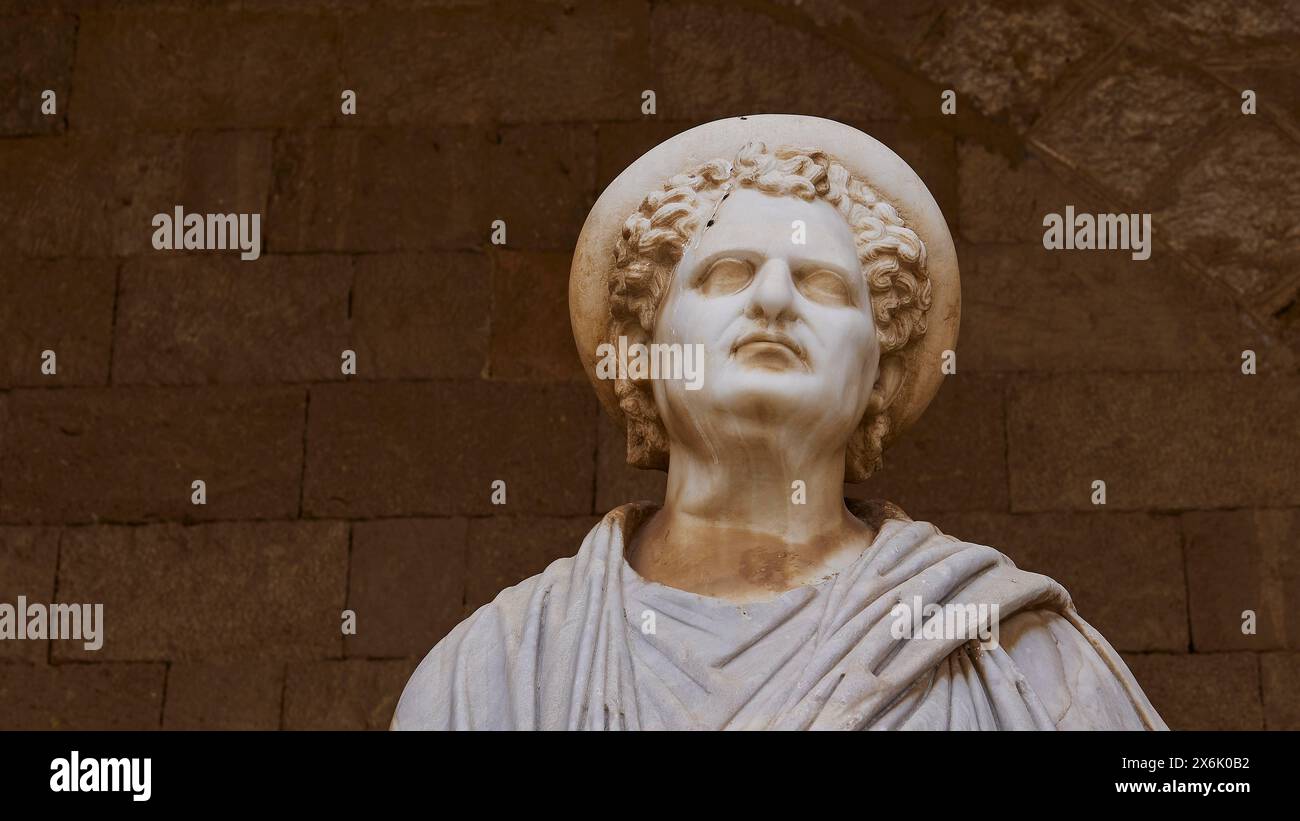 Portrait of an ancient statue with curls and lively facial features ...