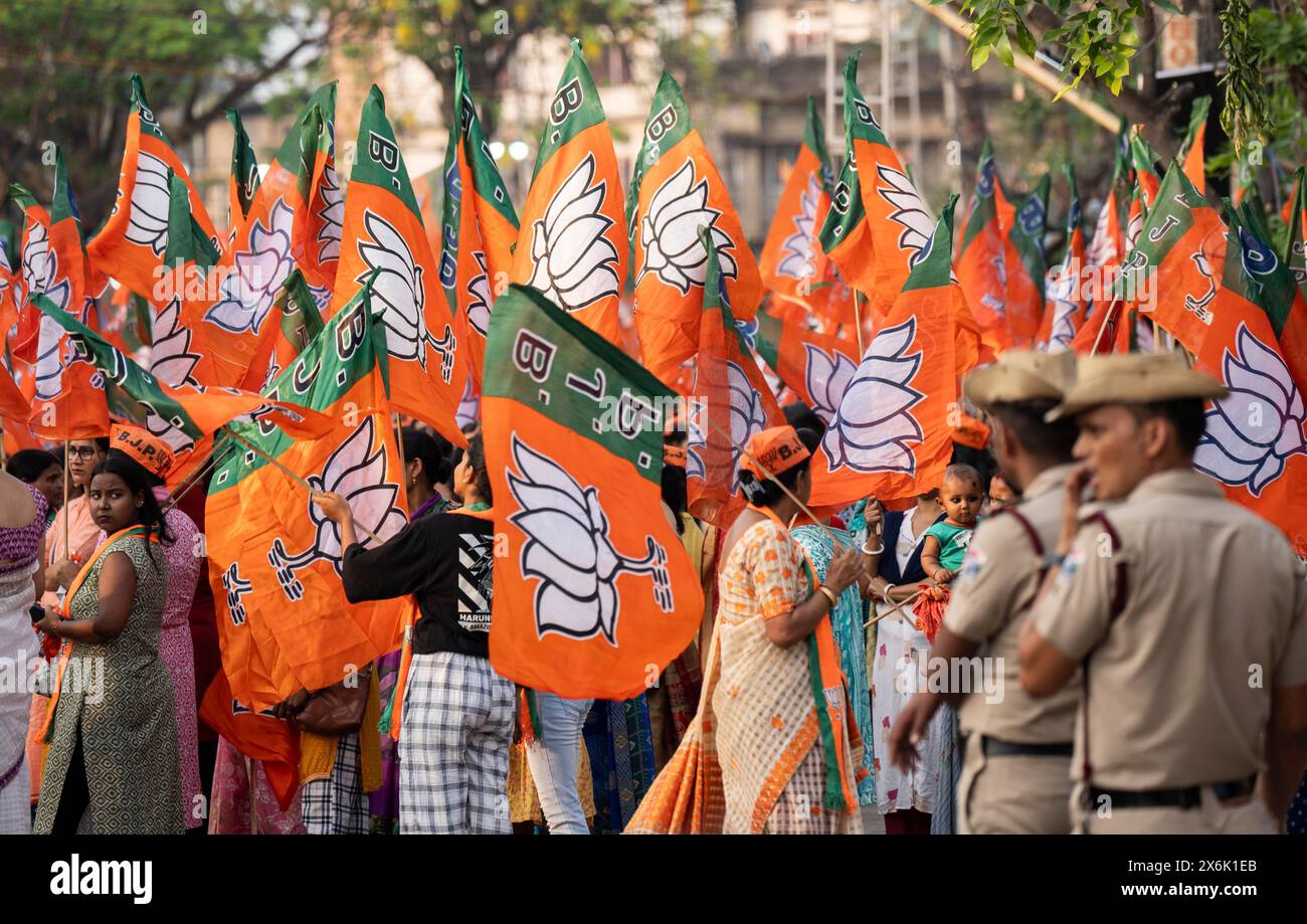 Bharatiya Janata Party (BJP) supporters holding BJP flags arrives to to ...