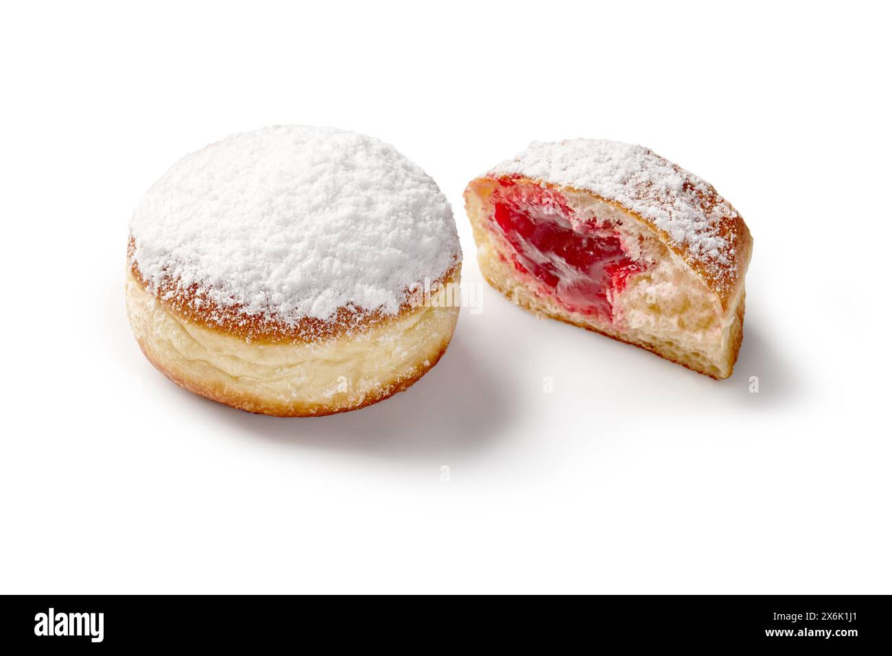 Jelly doughnuts with raspberry filling and powdered sugar Stock Photo ...