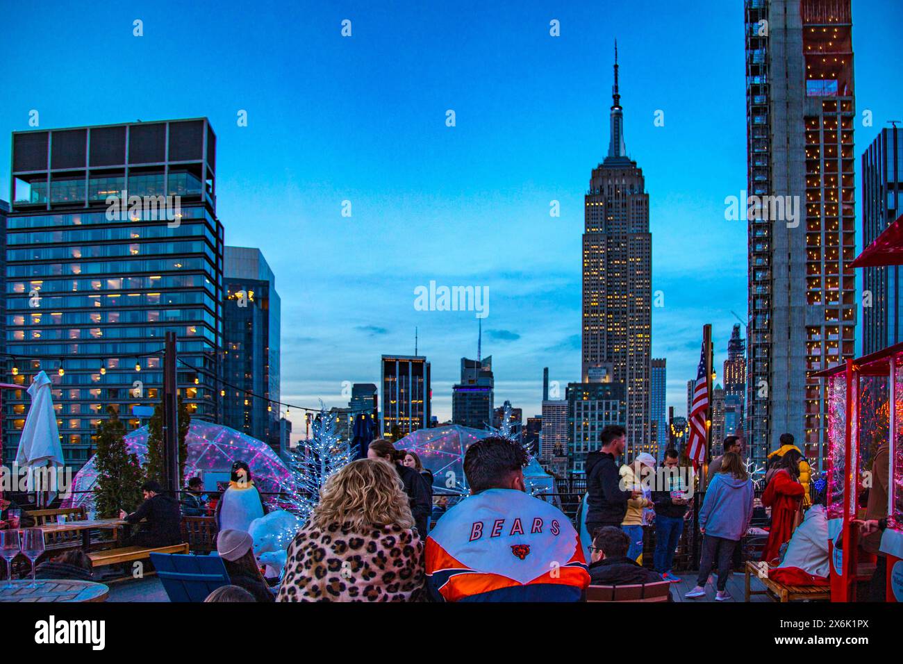 Open-air terrace on the 20th floor: 230 Fifth Rooftop Bar NYC in front ...