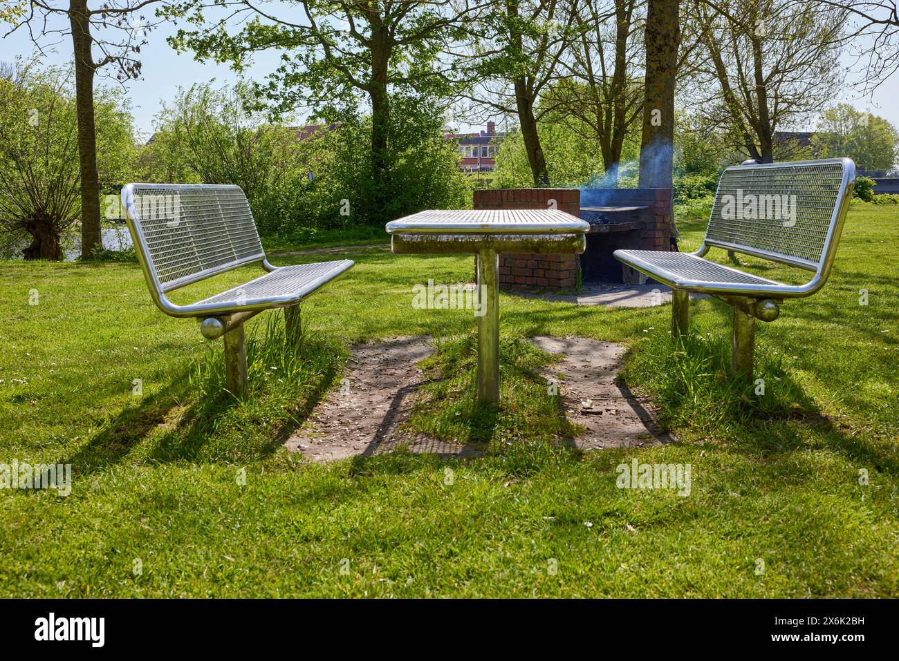 Public barbecue area with brick-built, smoking barbecue and stainless ...