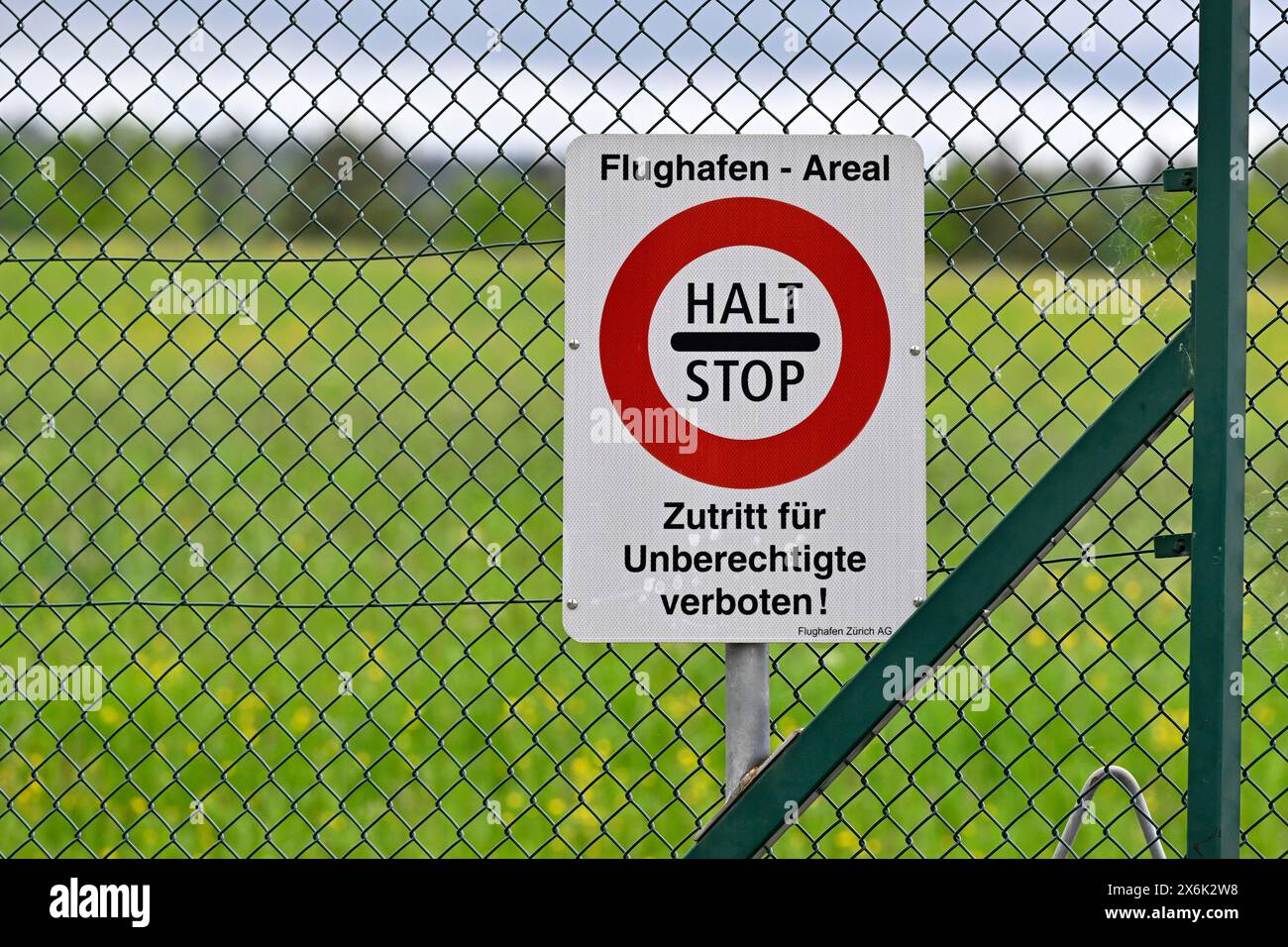 Warning sign Halt Stop airport area Stock Photo - Alamy