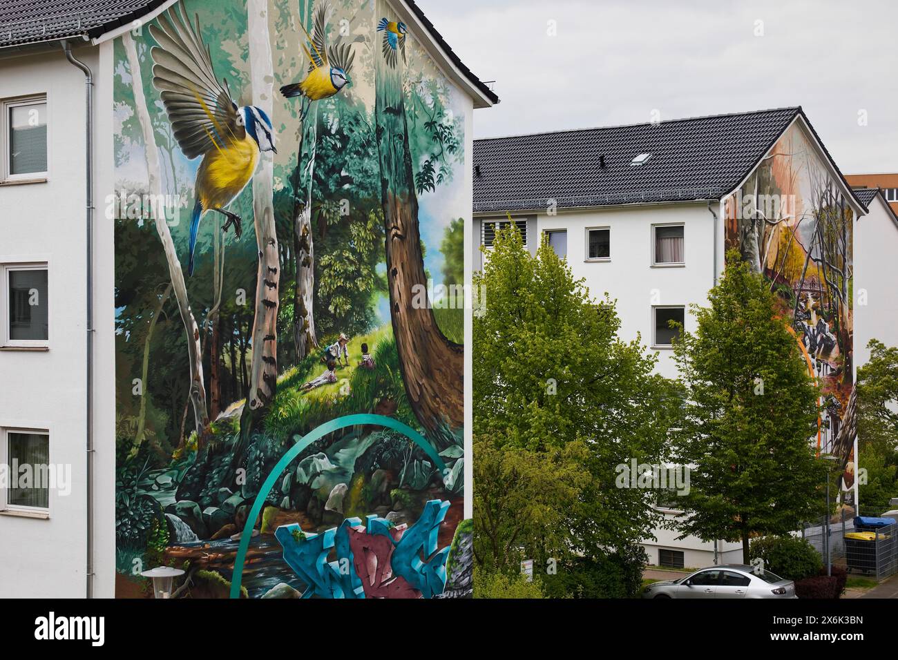 Artistic facade design on a block of flats, street art, graffiti artist ...