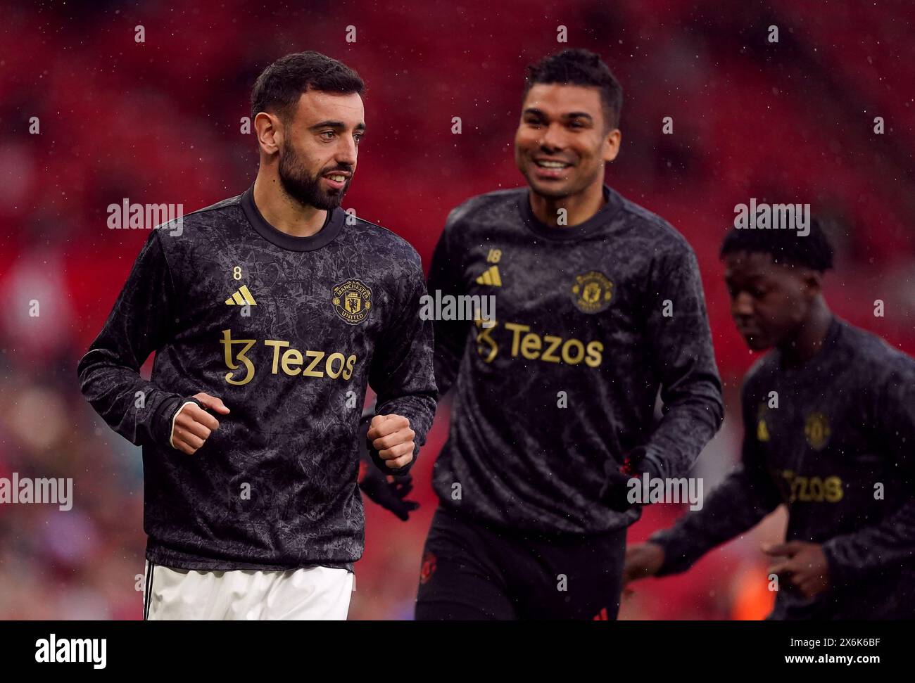 Manchester United's Bruno Fernandes warms up before the Premier League ...