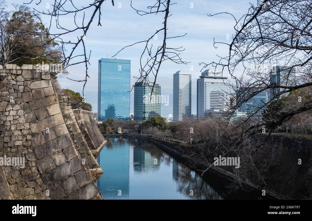 View down Osaka Castle Moat to modern highrises and Business Park ...