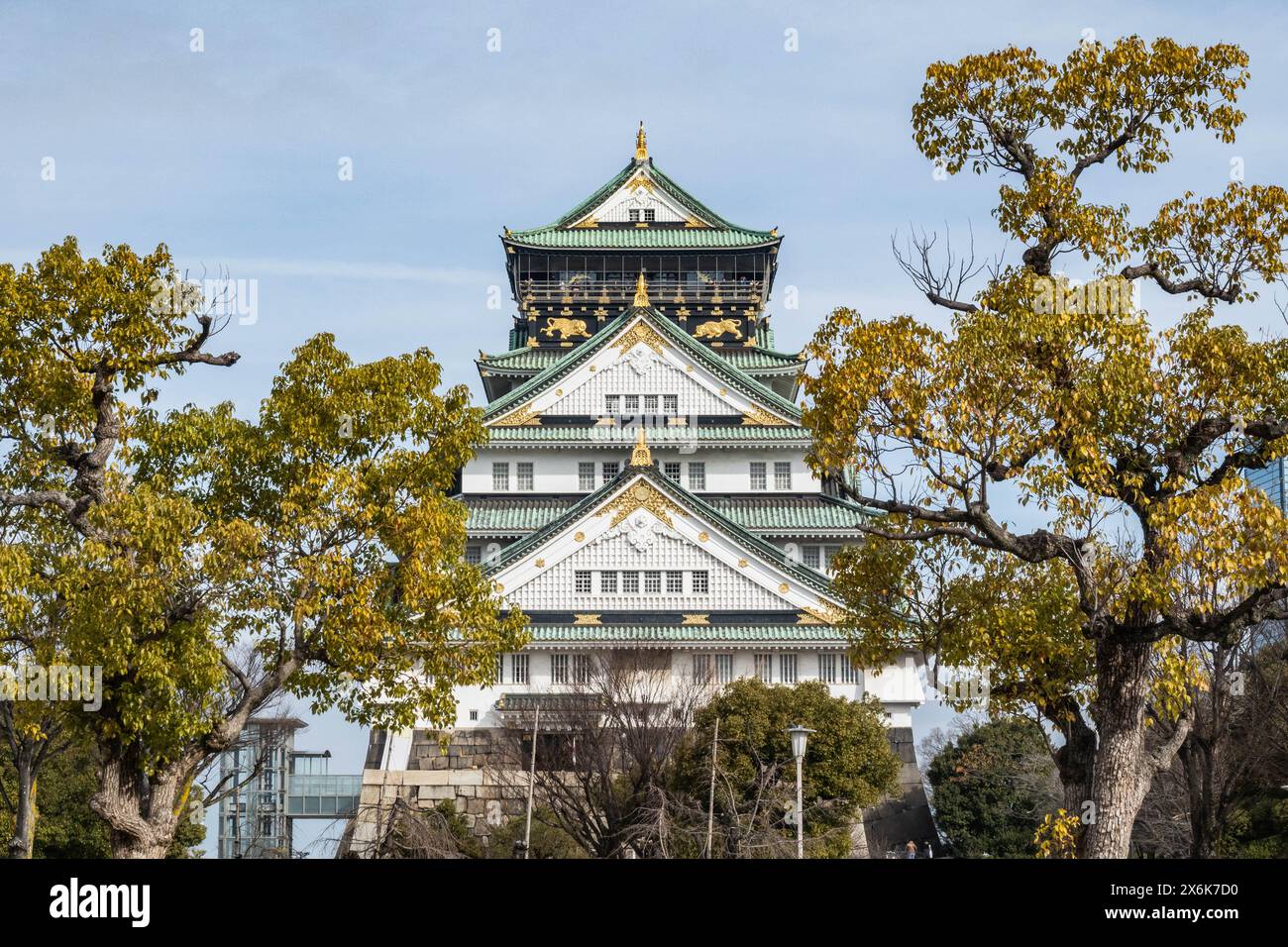 Osaka Castle rises above Osaka Castle Park, Osaka, Japan Stock Photo ...