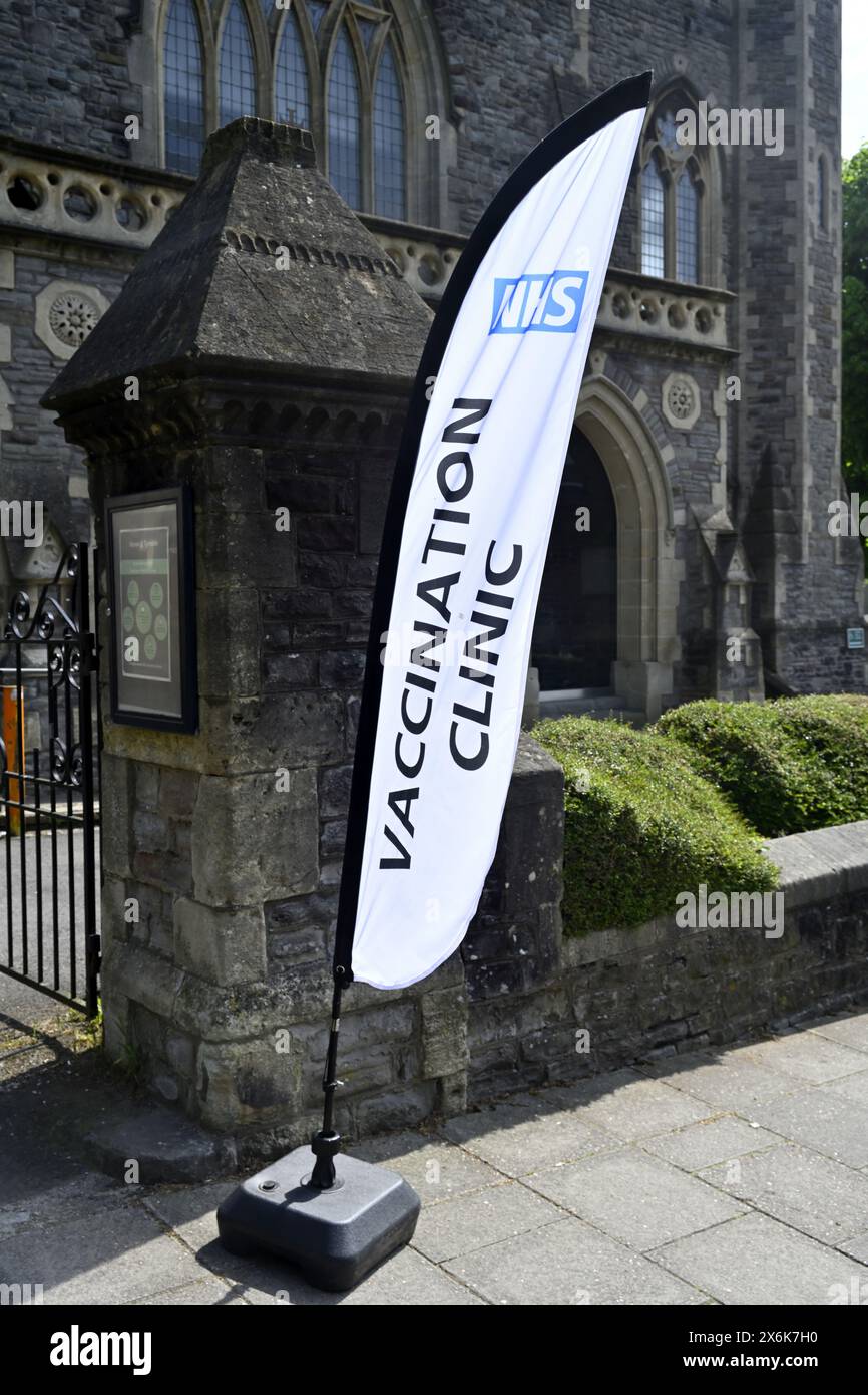 NHS Vaccination Clinic advertising entrance flag to temporary mass ...