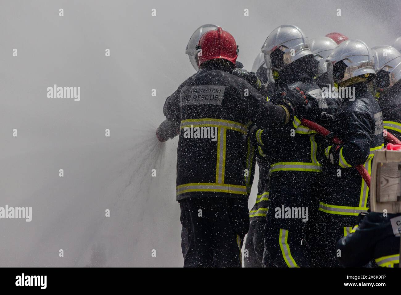 HAL FAR, MALTA - APRIL 28th, 2024 Firefighters spraying water at the ...