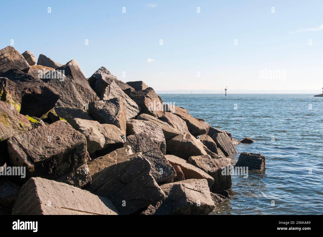 large rocks boulders form the new sea defences along the foreshore ...