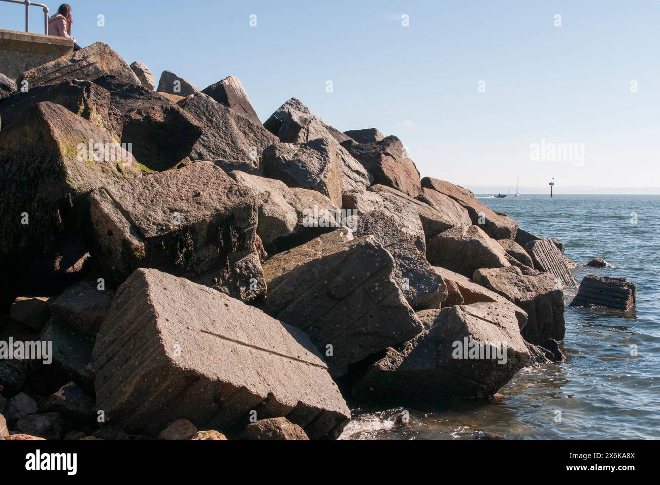 large rocks boulders form the new sea defences along the foreshore ...