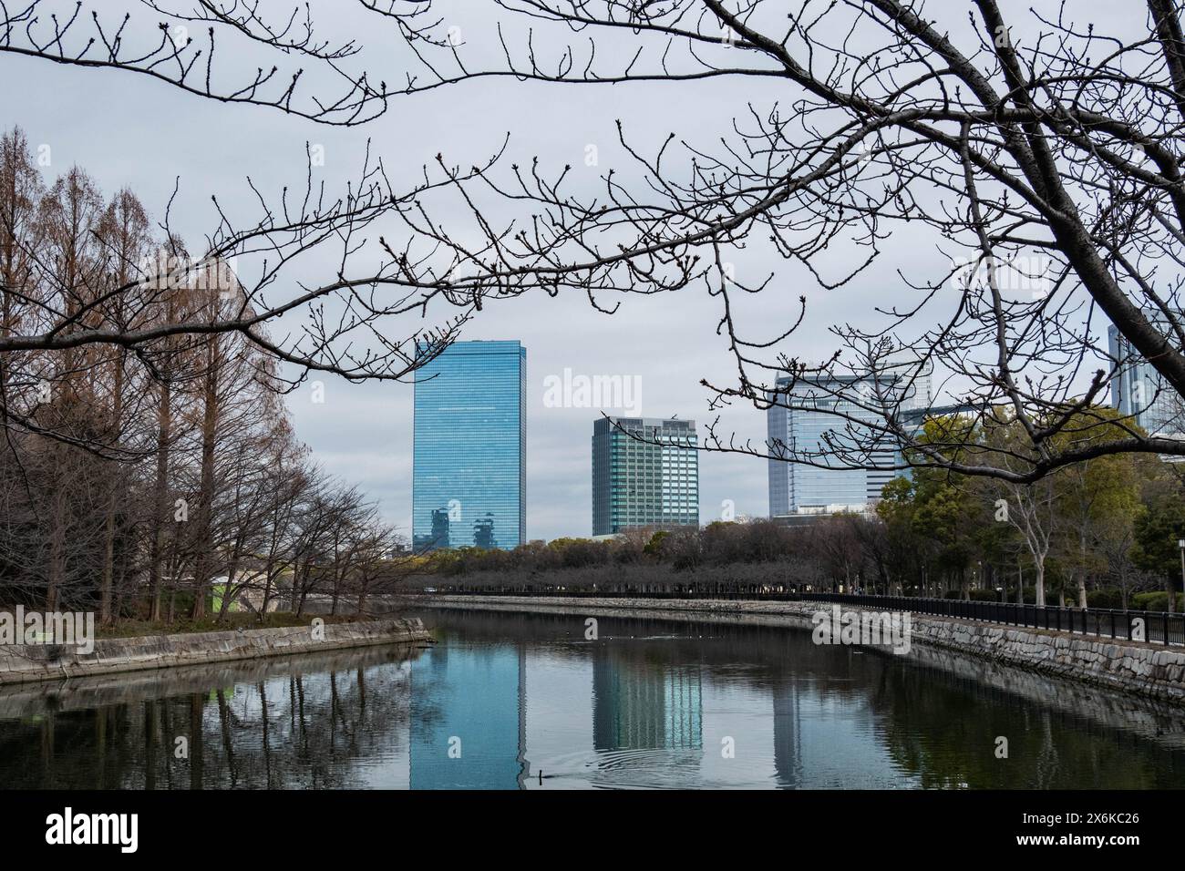 View down Osaka Castle Moat to modern highrises and Business Park ...