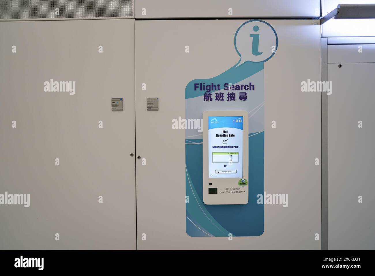 HONG KONG, CHINA - DECEMBER 04, 2023: interactive flight search self-service kiosk at check-in ...