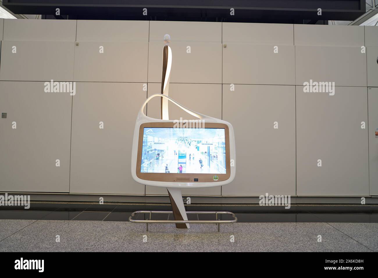 HONG KONG, CHINA - DECEMBER 04, 2023: interactive self service information kiosk at check-in ...