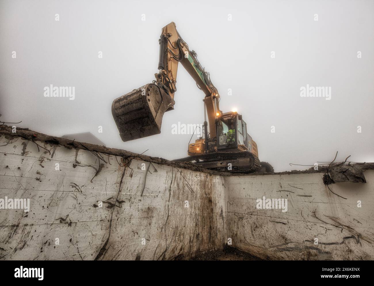 Excavator in action, Zug, Switzerland Stock Photo - Alamy