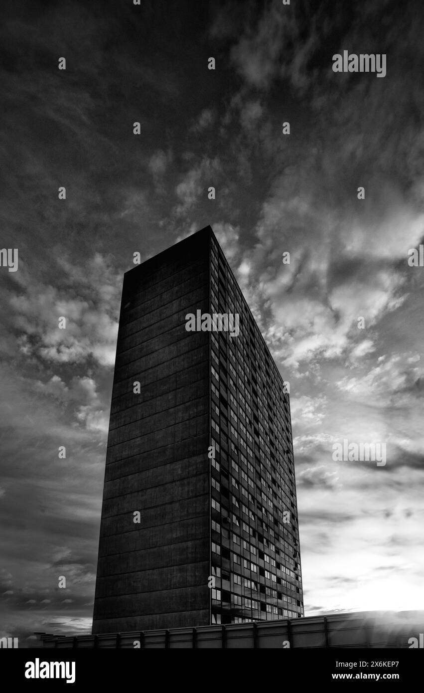 High-rise building from below rises into the sky Stock Photo - Alamy