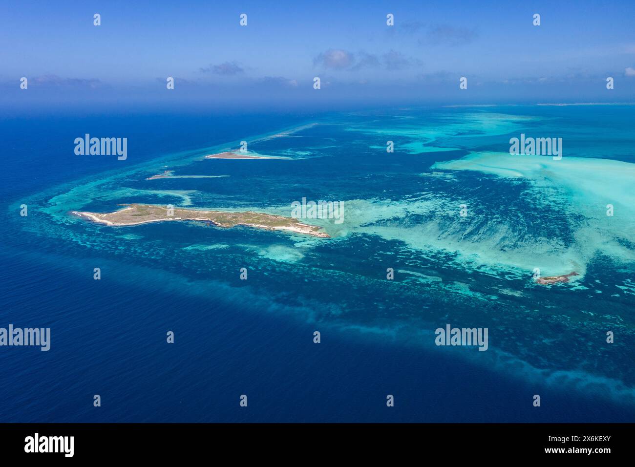 Aerial view of reef and island, Cosmoledo Atoll, Outer Seychelles ...