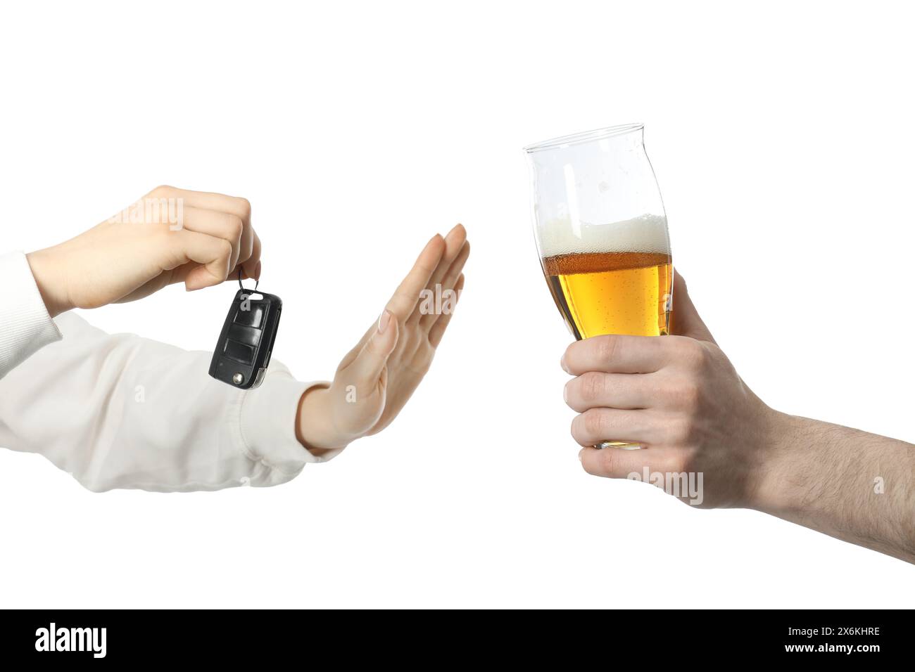 Woman with car keys refusing alcohol while man suggesting her beer on ...