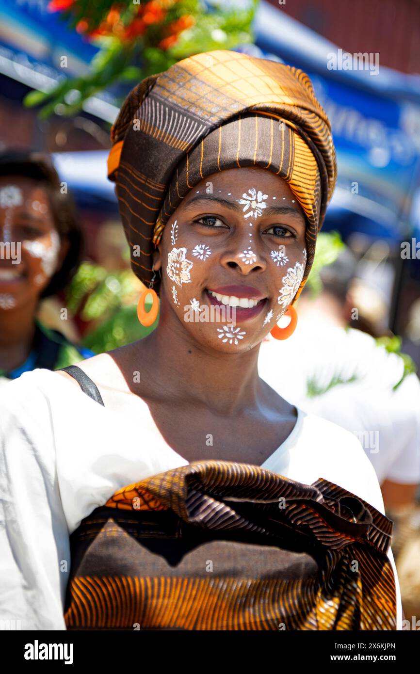 Happy woman with decorative face painting from Masonjoany, Mahajanga ...