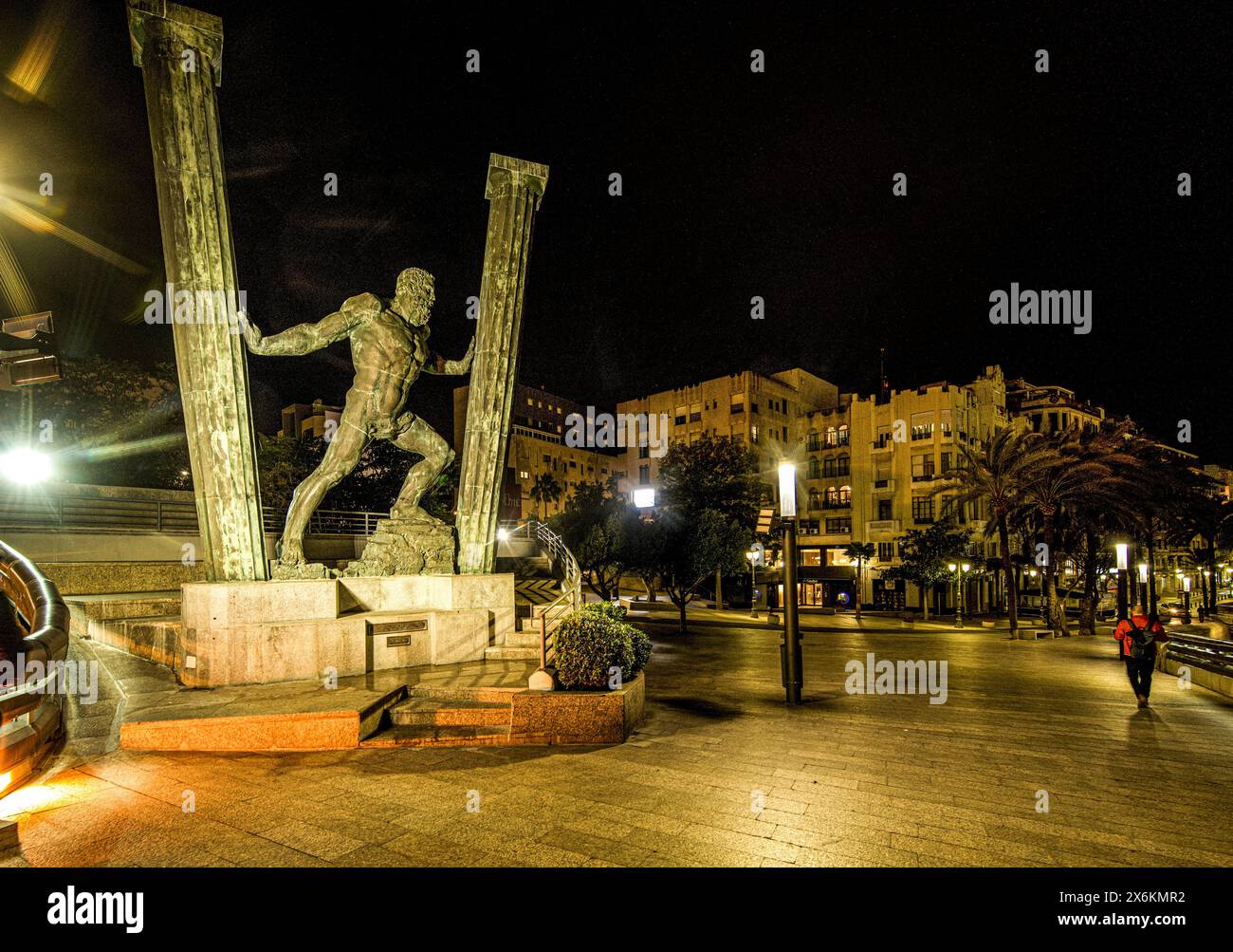 Statue of the Pillars of Hercules on the seafront of Ceuta at night ...
