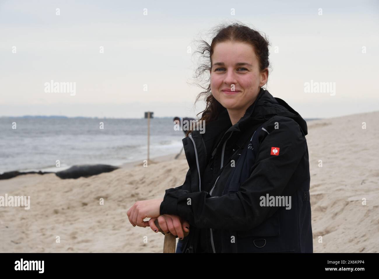 List, Germany. 09th May, 2024. Ranger Stella Kinne stands on the beach ...
