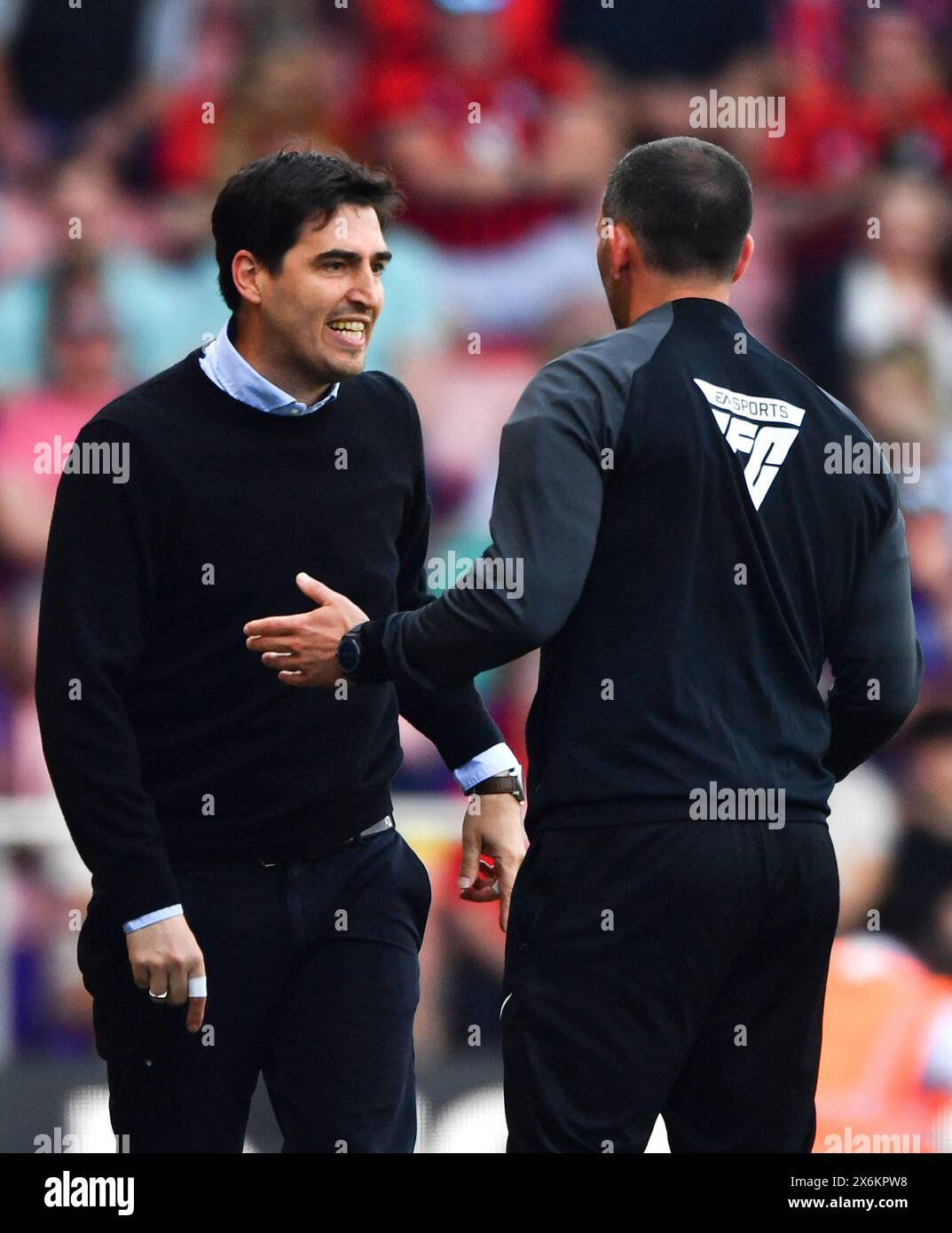 AFC Bournemouth manager Andoni Iraola argues with the 4th official and ...