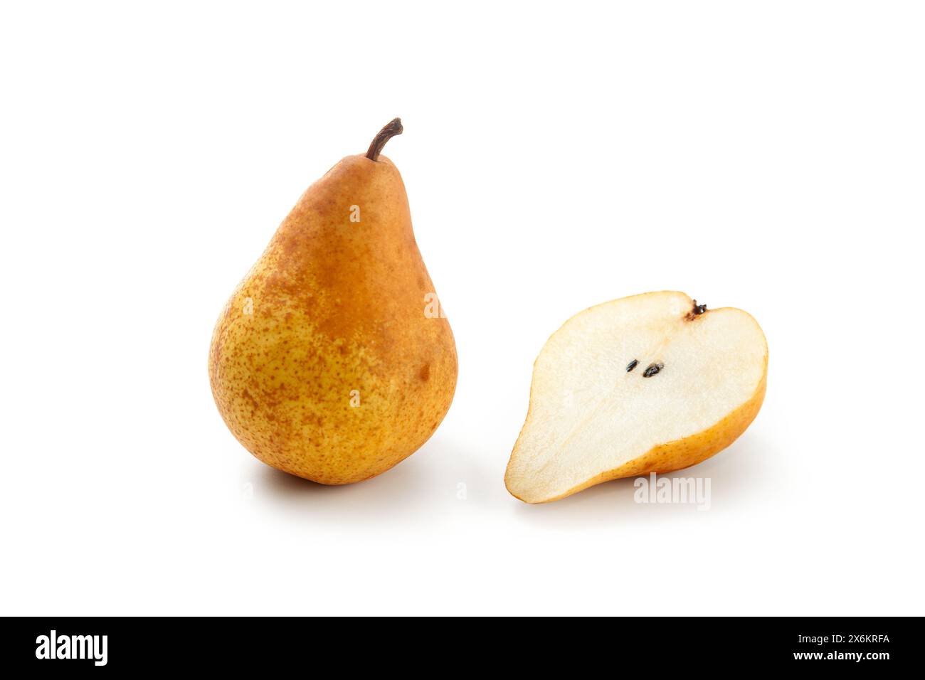 Whole and half of ripe juicy pear fruit with soft shadow isolated on ...