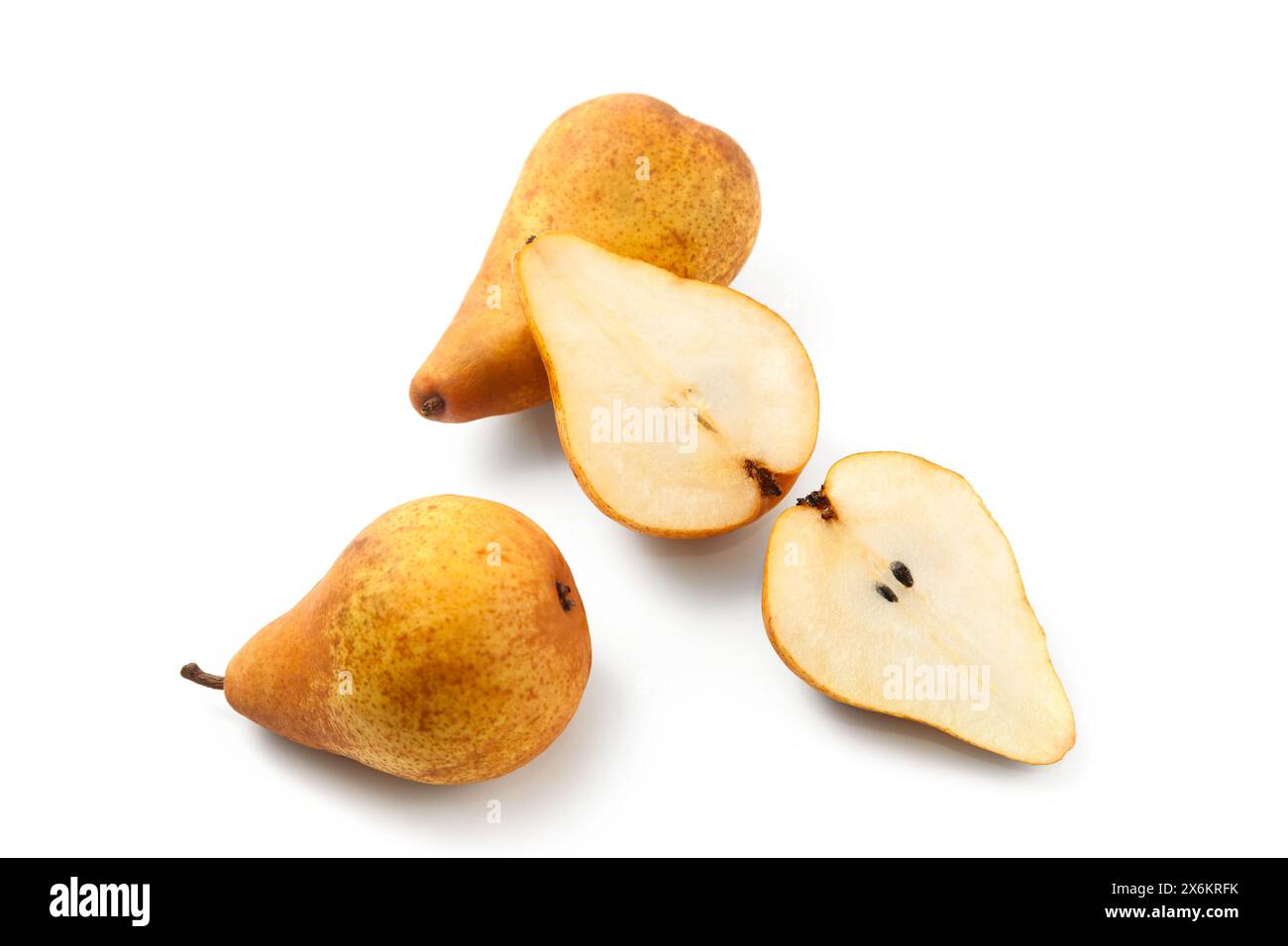 Two whole and halves of ripe juicy pear fruits with soft shadow ...