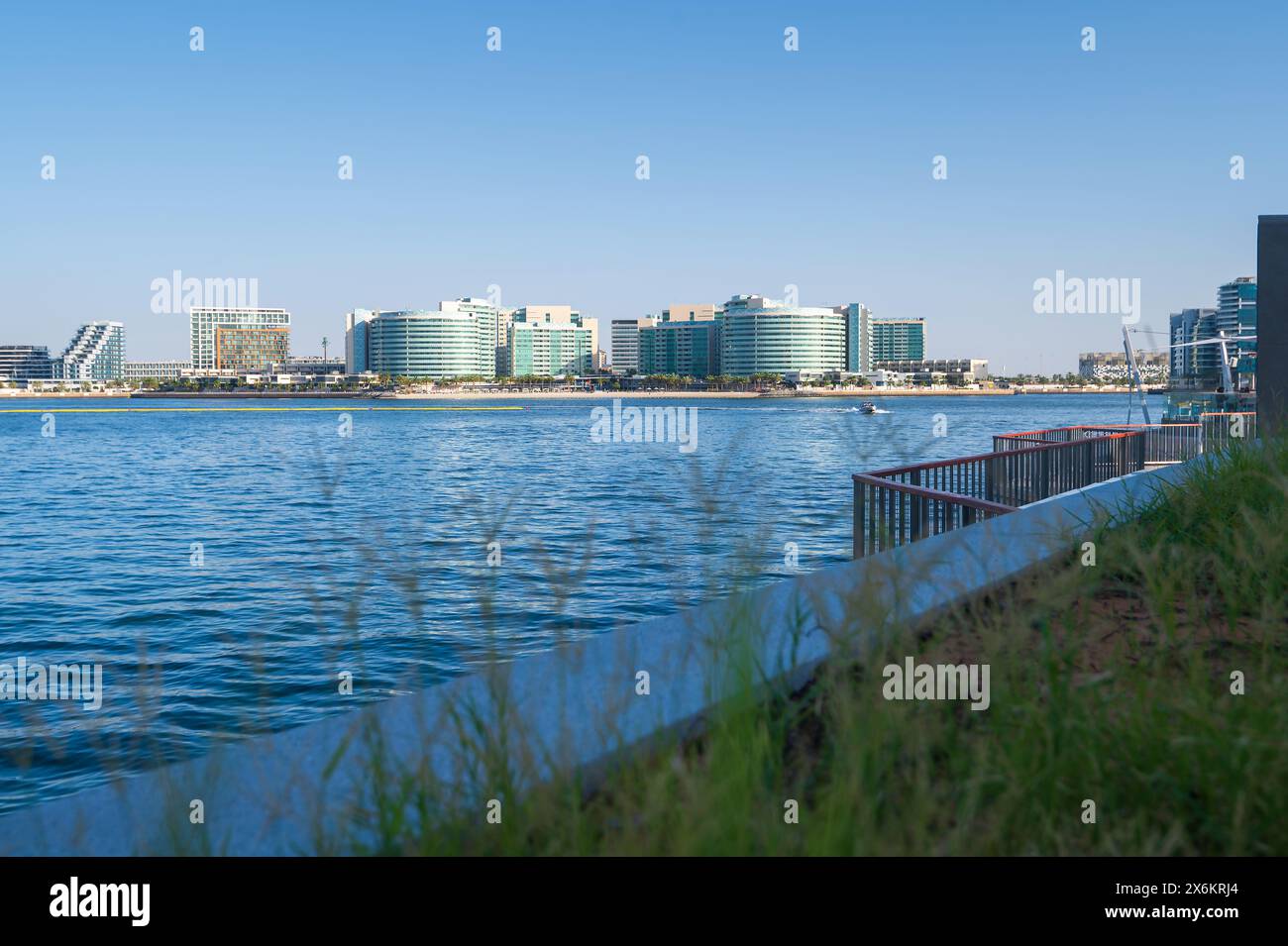 This beautiful image captures a tranquil boat ride scene at the Al Raha ...