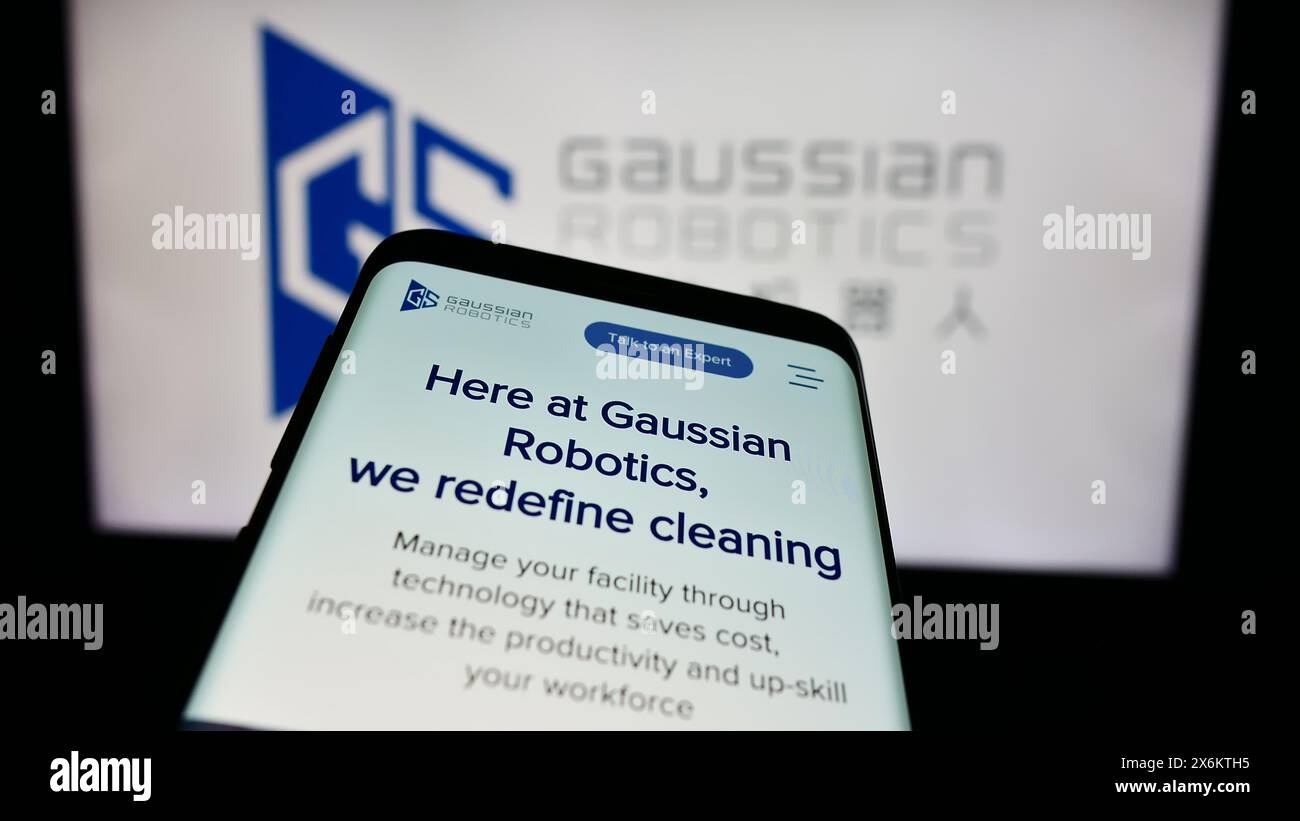 Mobile phone with website of Singaporean company Gaussian Robotics Pte ...