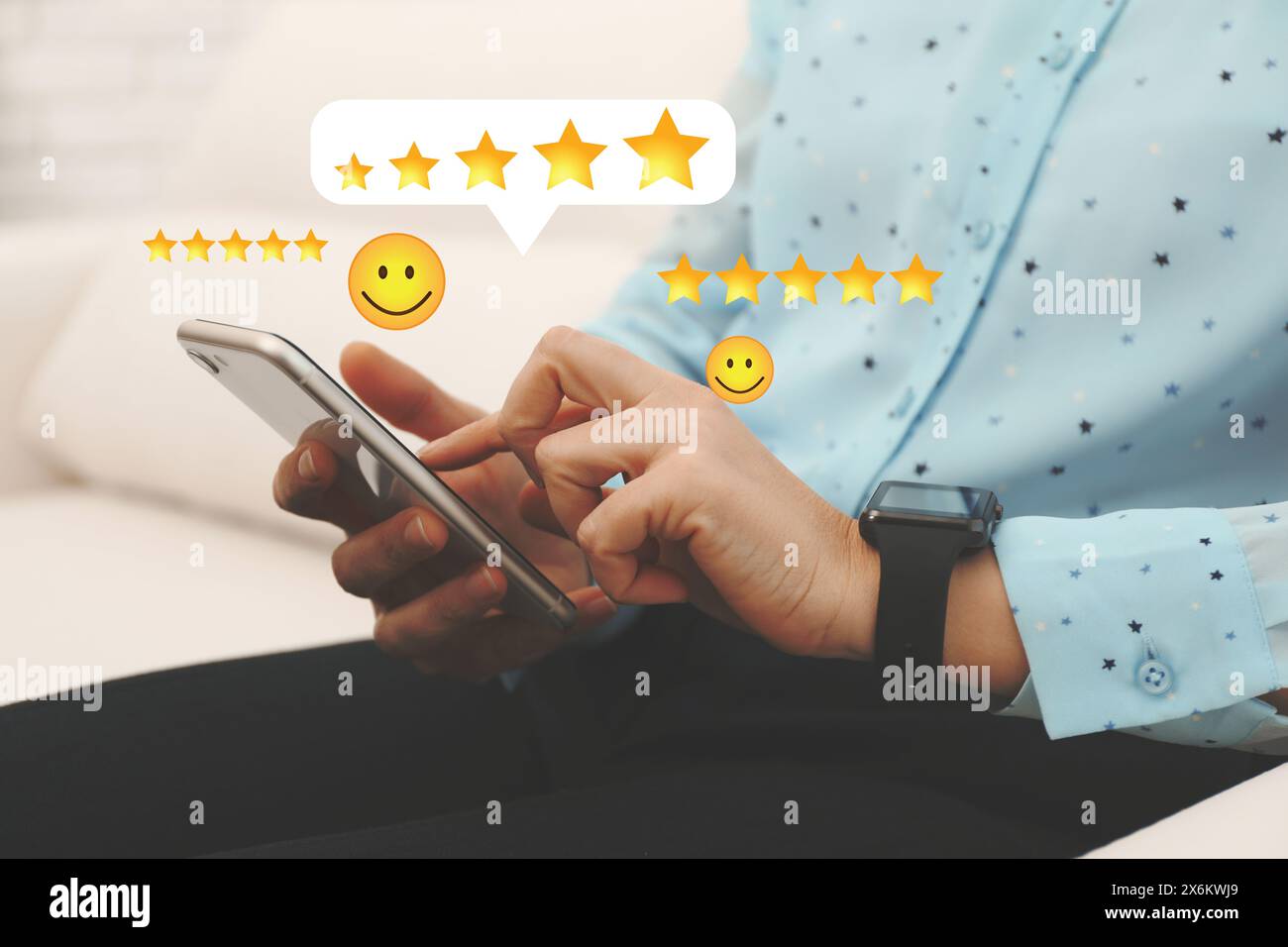 Woman leaving service feedback with smartphone at home, closeup. Stars ...