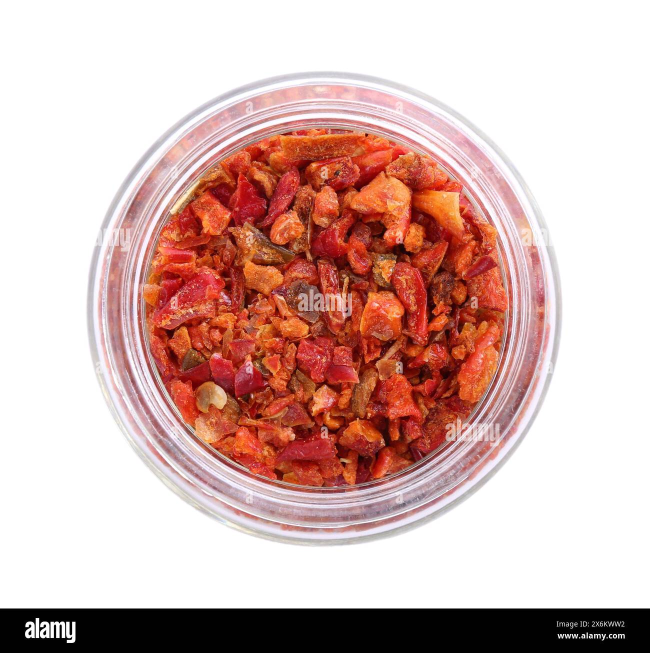Aromatic spice. Red chili pepper flakes in jar isolated on white, top ...