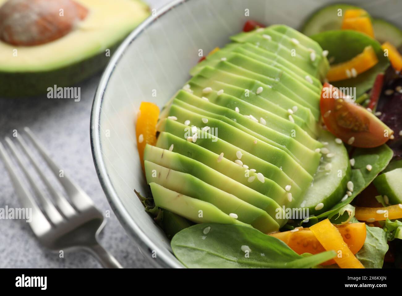Healthy dish high in vegetable fats on light table, closeup Stock Photo ...