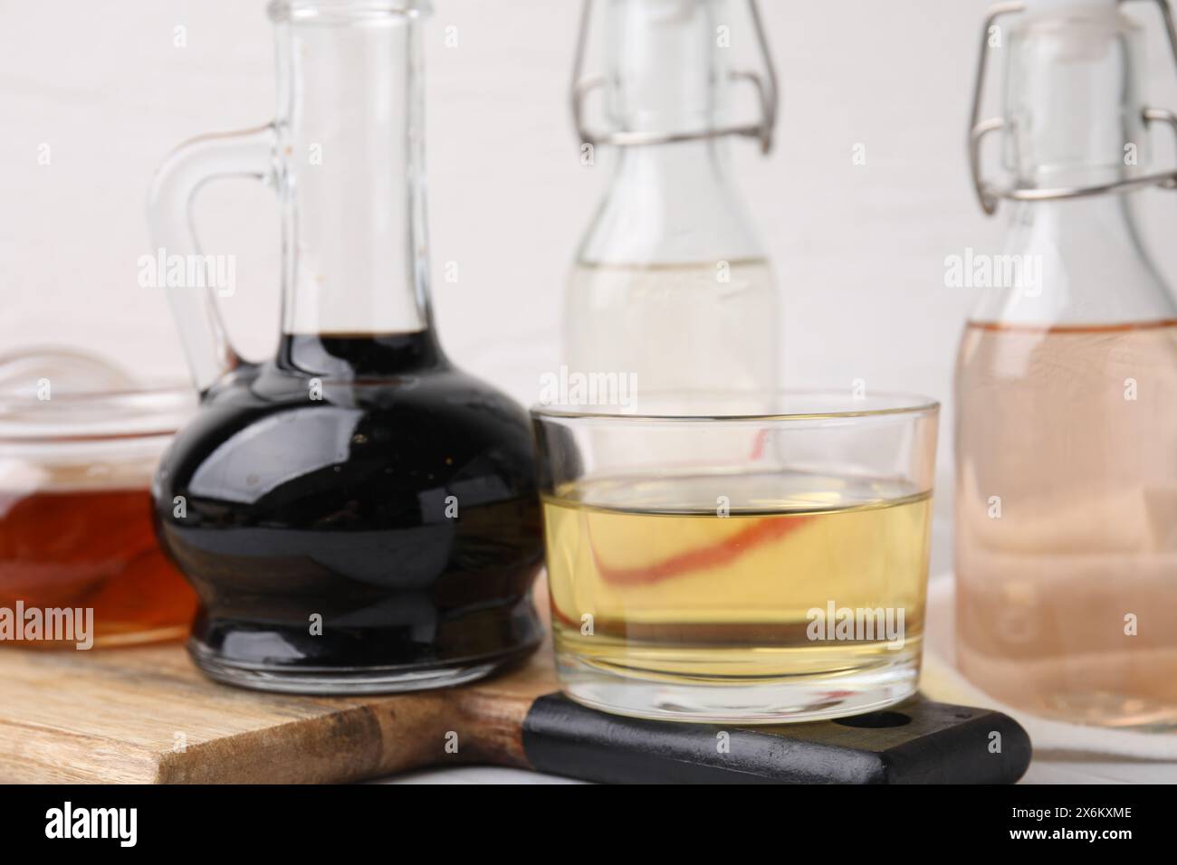 Many different types of vinegar on table Stock Photo - Alamy