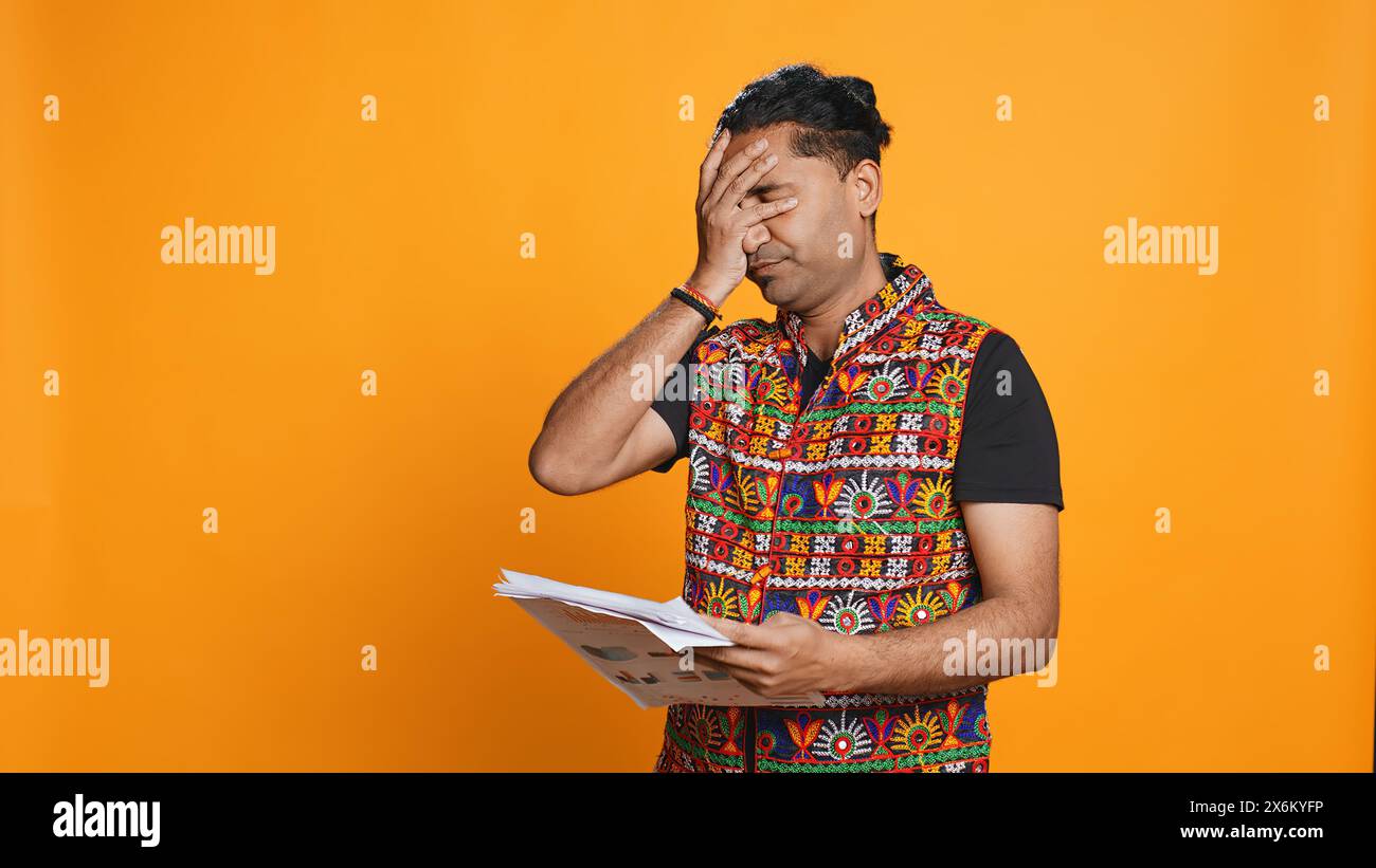 Angry indian man throwing studio hi-res stock photography and images ...