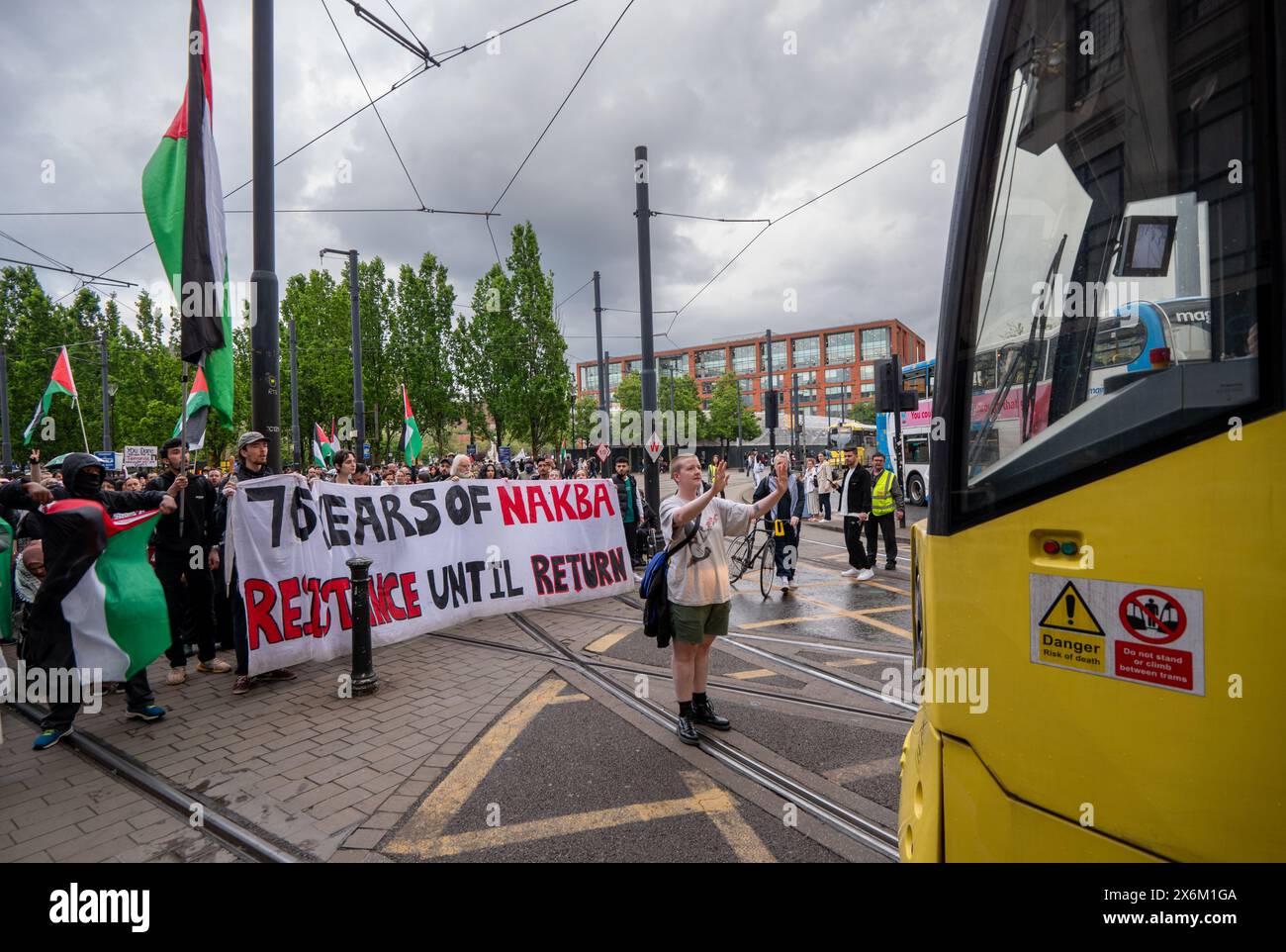 Protester stops tram. Palestinian Protest marks the 76th anniversary of ...
