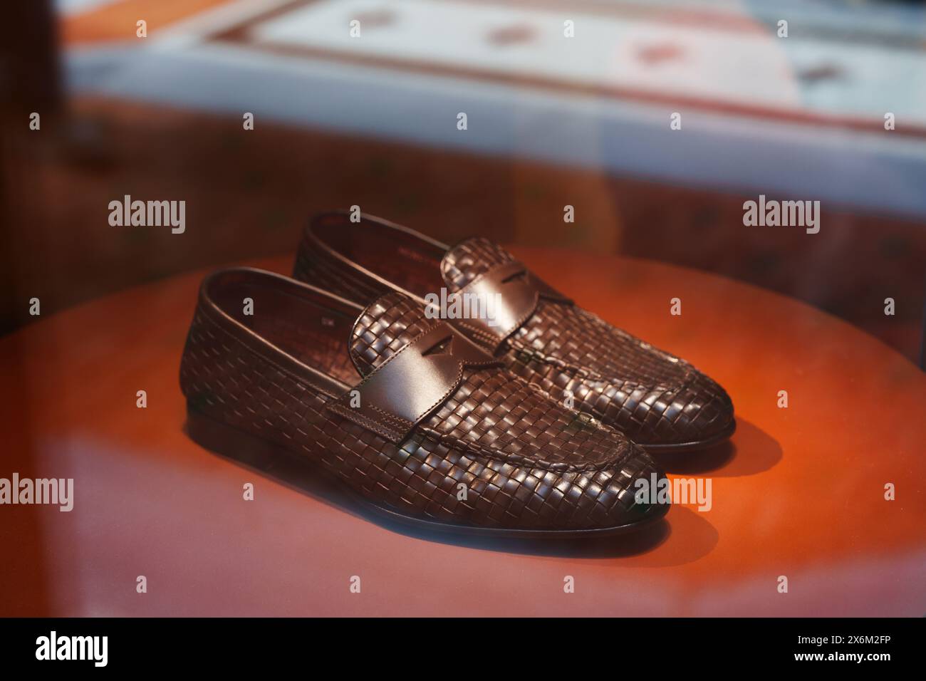 Milan, Italy - 24.04.2024: Santoni shoes at the showcase of the store ...