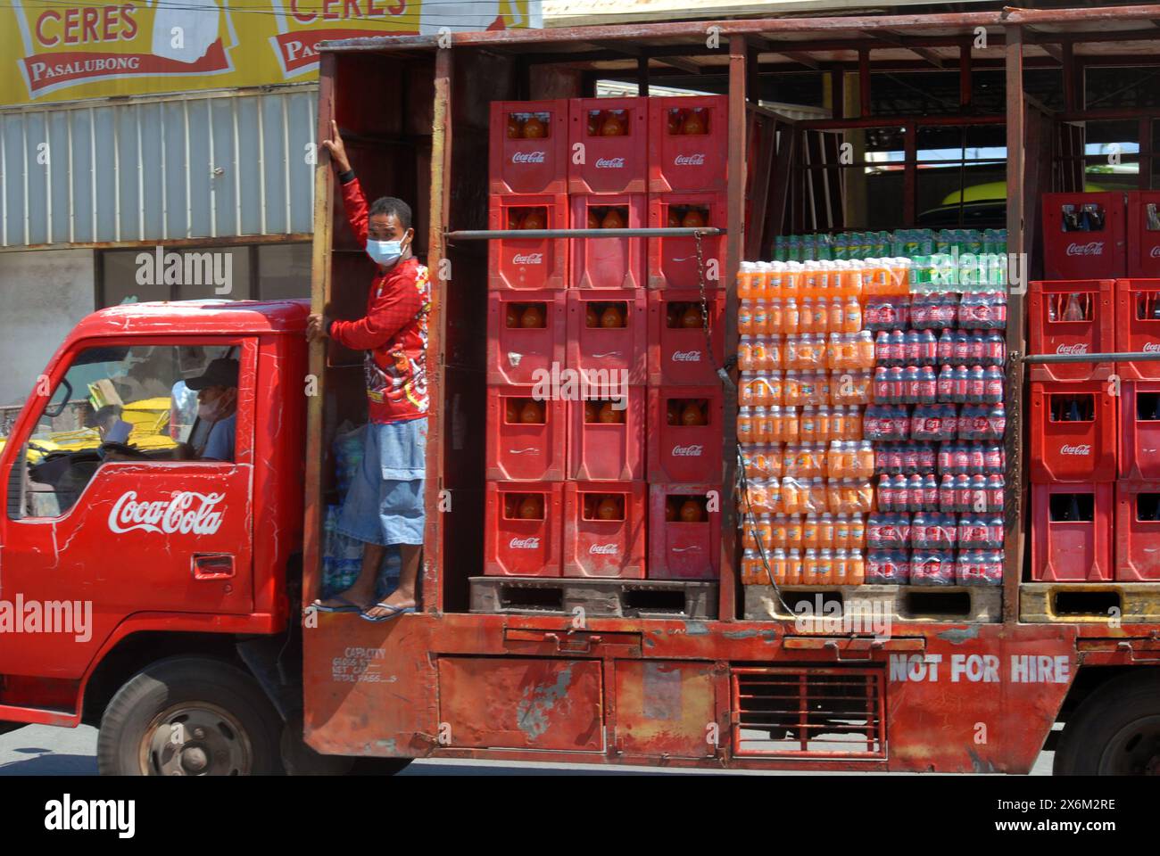 Coca Cola truck making a delivery in Cadiz City, Negros Occidental ...