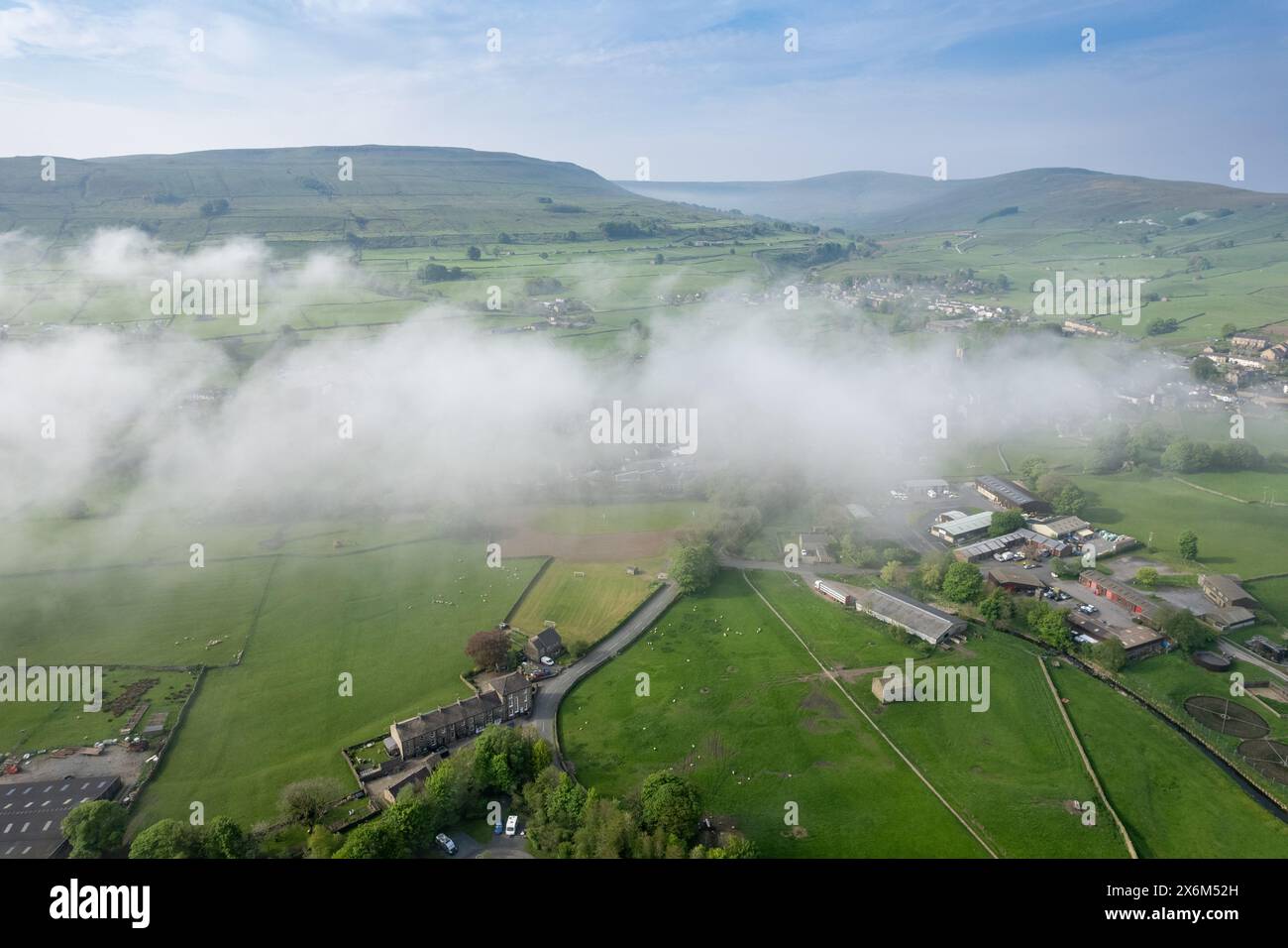 The market town of Hawes taken from a drone on a misty spring morning ...