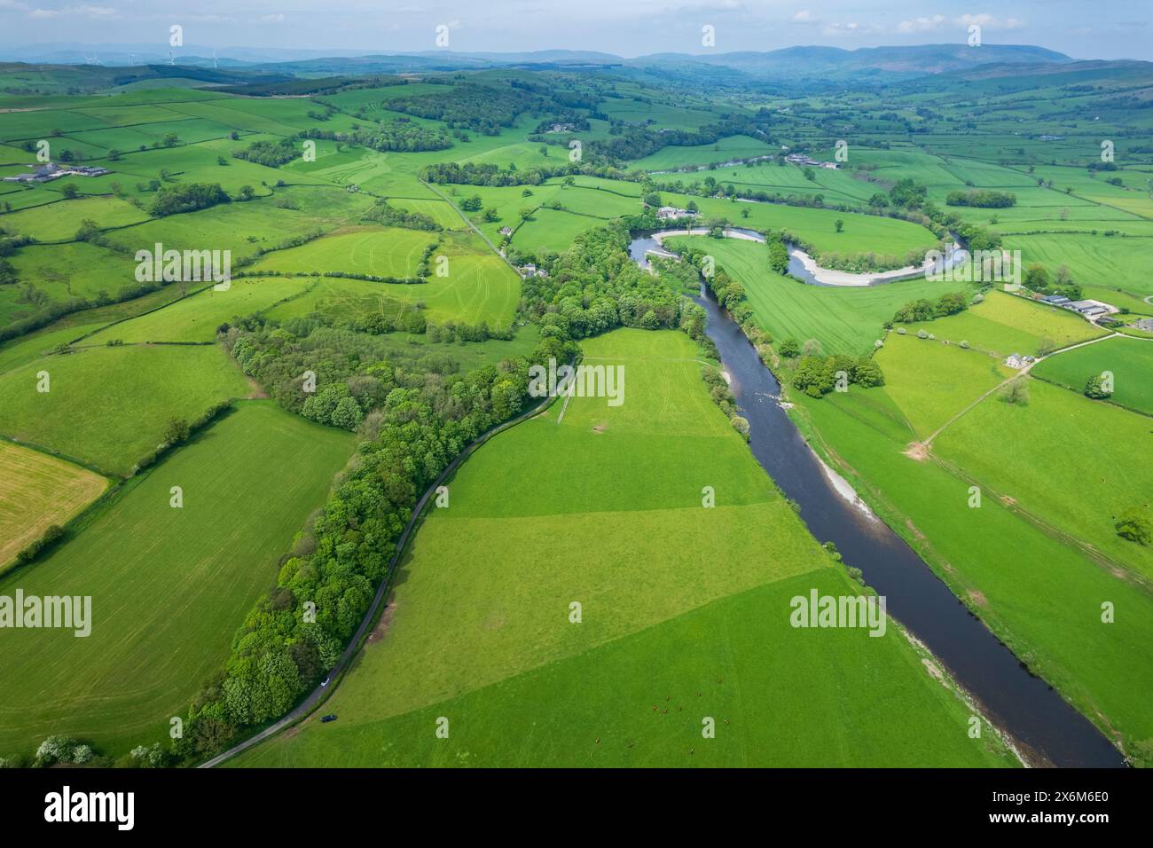 The river Lune, flowing through farmland in the Lune Valley near Kirkby ...