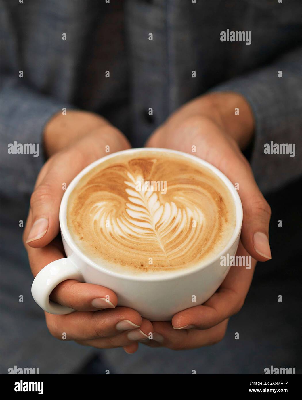 Cappuccino with milk foam pattern Stock Photo - Alamy