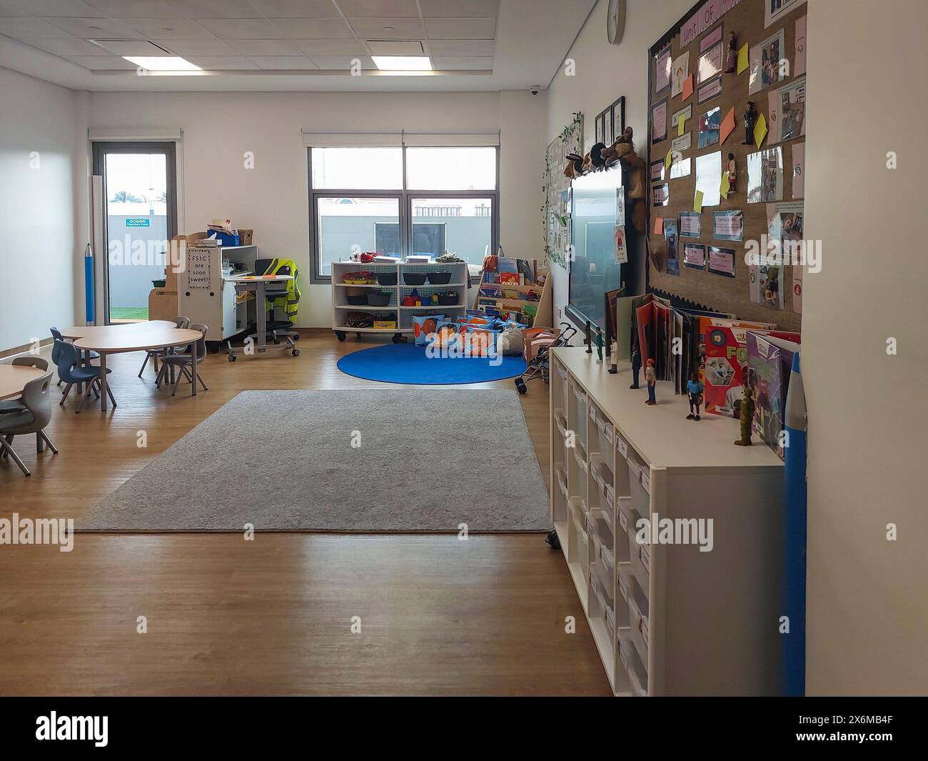 Empty classroom with chairs and tables in campus. Daycare center ...