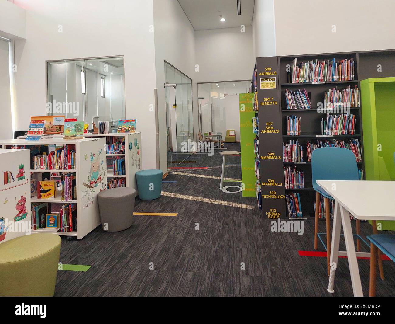 Empty classroom with chairs and tables in campus. Daycare center ...
